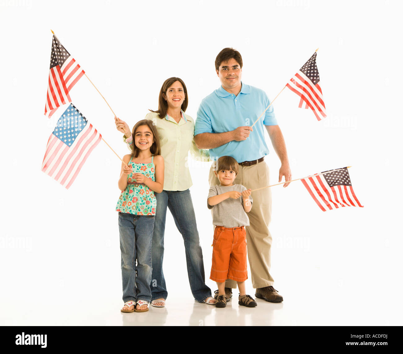 Hispanic family holding American flags Stock Photo - Alamy