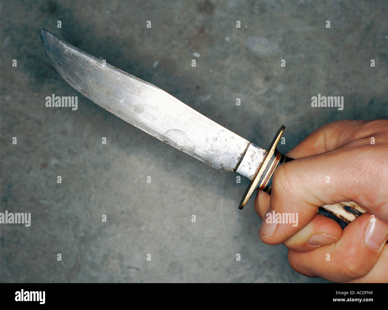 Hand with a knife hi-res stock photography and images - Alamy