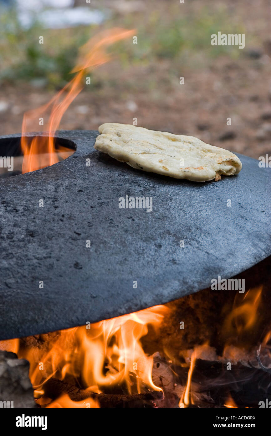 A pita bread baked on a tabun fire outdoors Stock Photo - Alamy