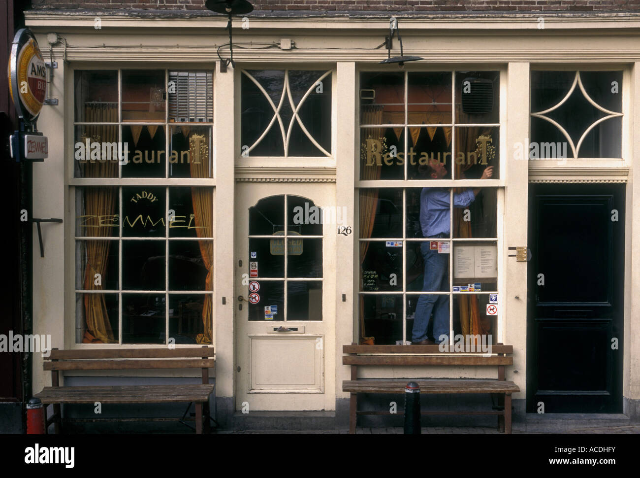 worker repairing window, Zemmel Restaurant, Dutch restaurant ...