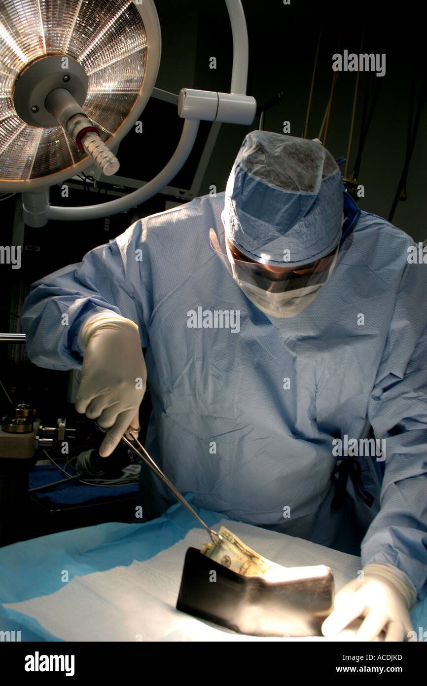 Cash-ectomy with light Stock Photo - Alamy