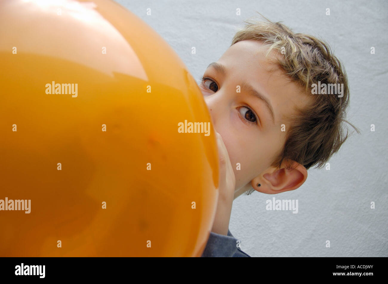 Boy with balloon Stock Photo - Alamy