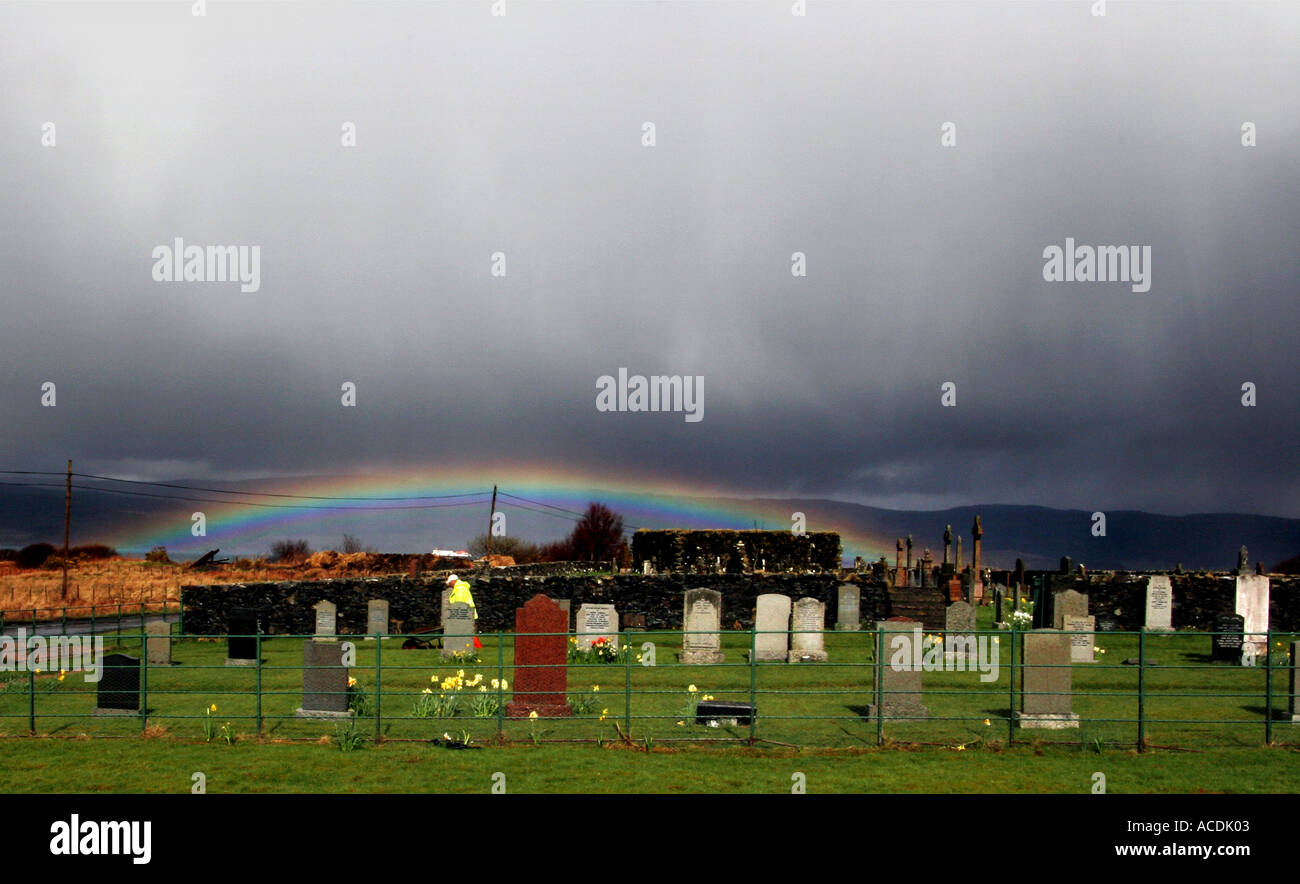 graveyard with rainbow Stock Photo - Alamy