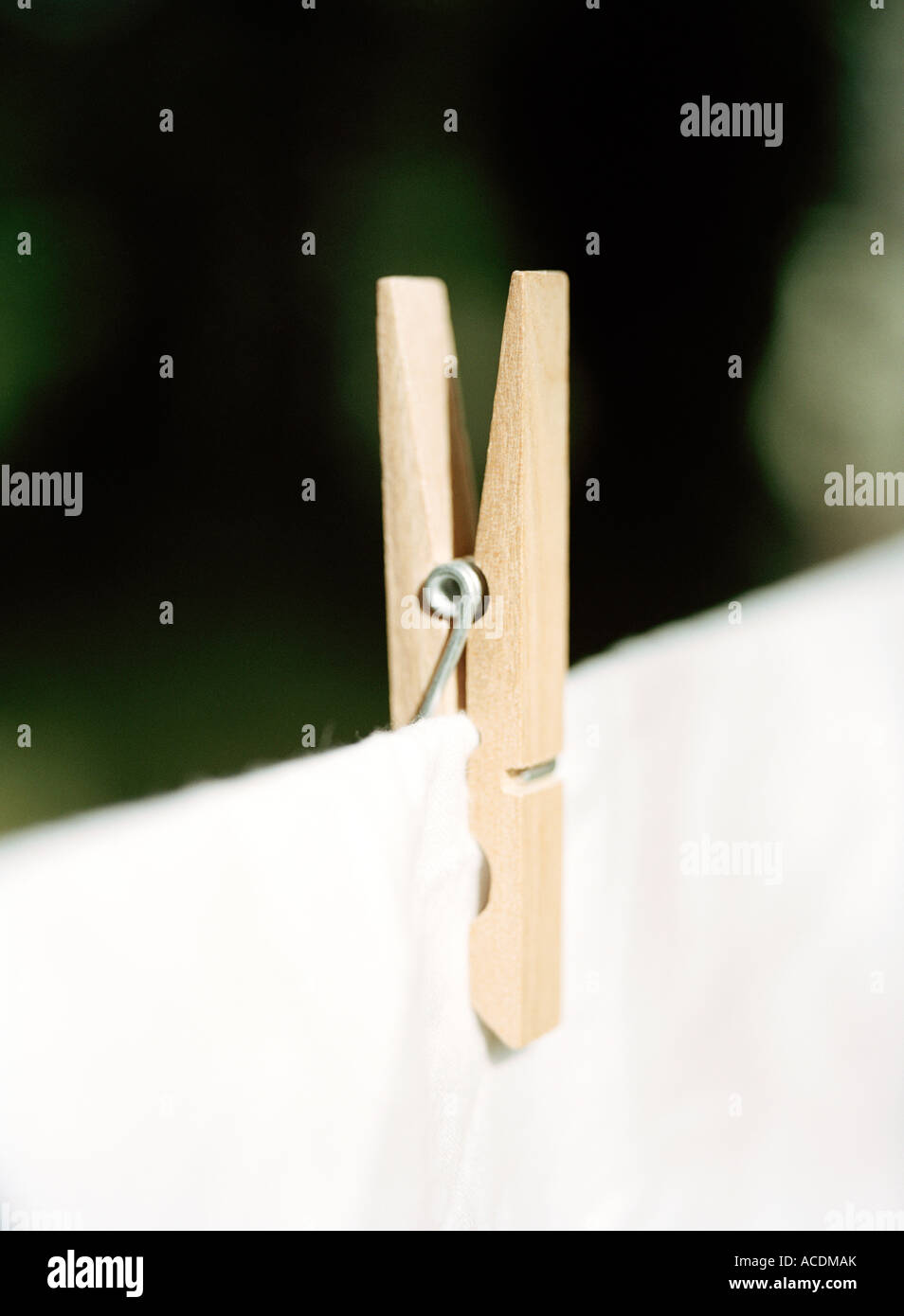 A clothes-peg on laundry close-up Stock Photo - Alamy
