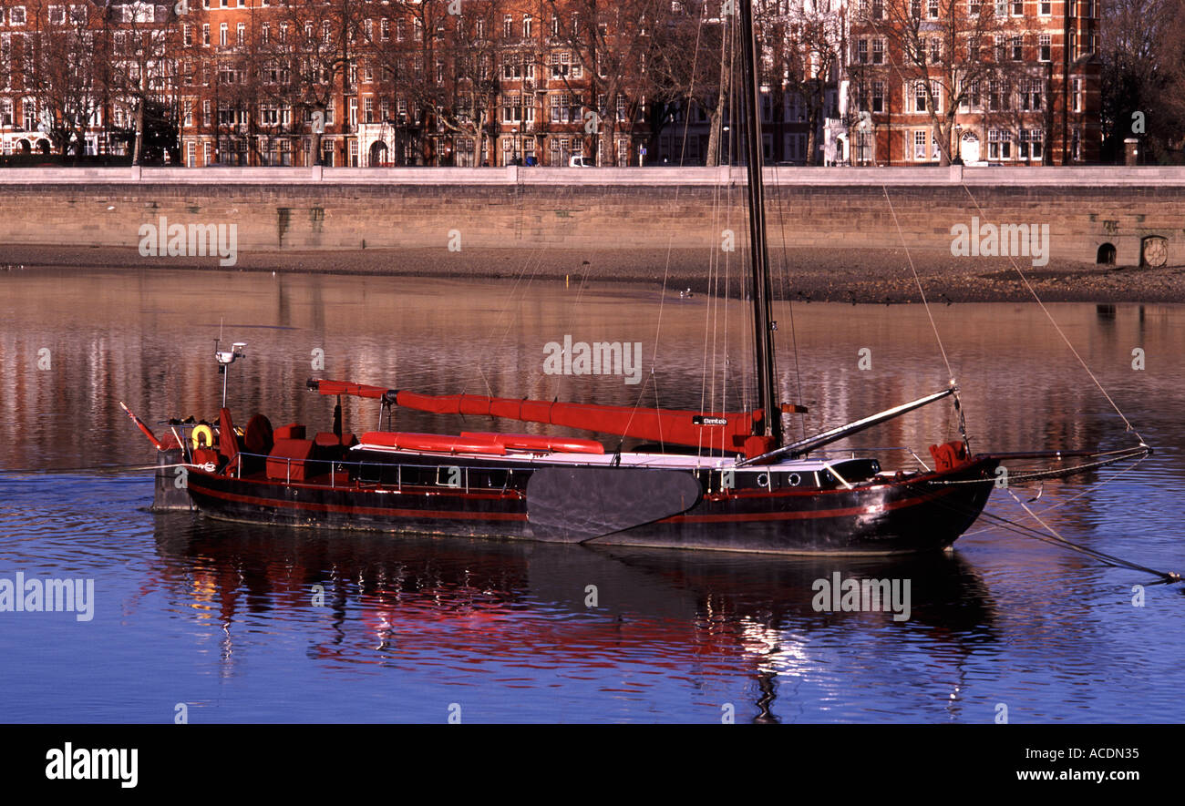 Masted Dutch barge moored on the River Thames before Chelsea Embankment ...