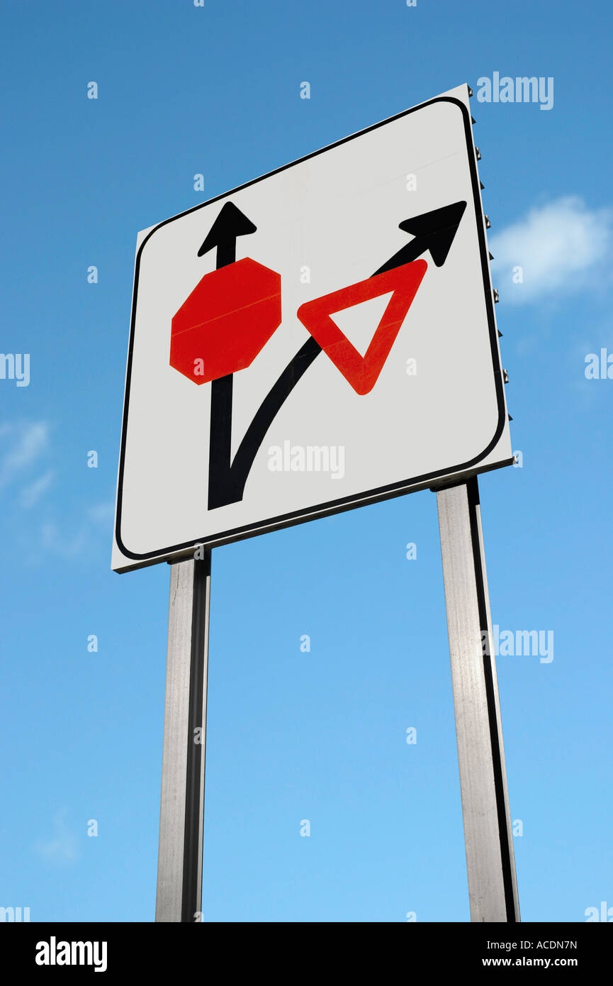 Continue straight and stop or curve right and yield road sign Stock ...