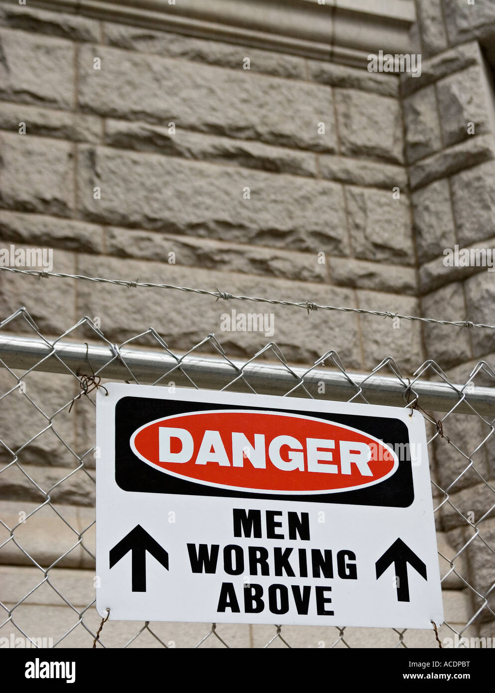 Danger - Men Working Above sign with up arrows Stock Photo - Alamy