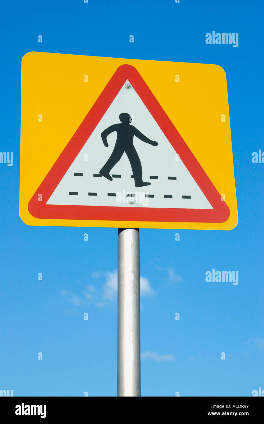 Caution - pedestrian crossing sign Stock Photo - Alamy
