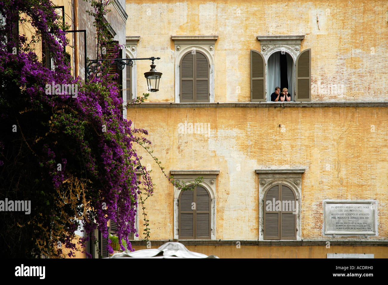 couple in the window of Italian old house, Piazza del Pantheon, Rome ...