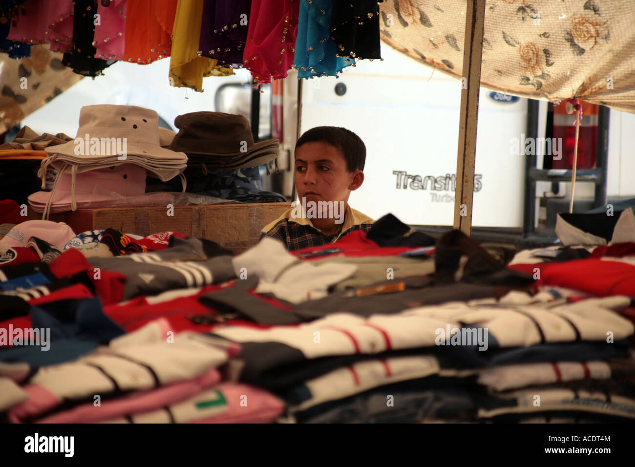 market stall sad boy Stock Photo - Alamy