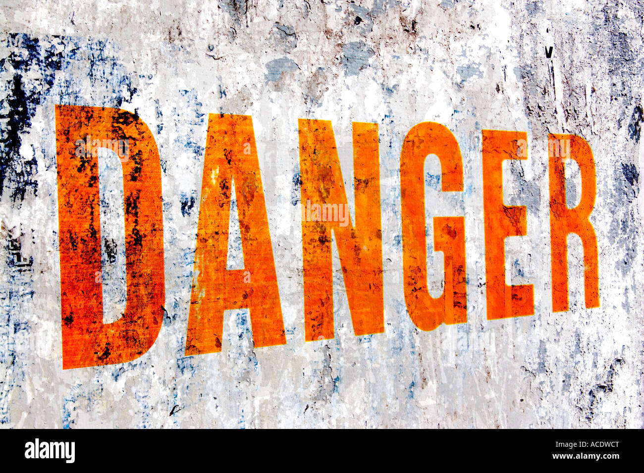 Photo illustration with word DANGER on weathered surface Stock Photo ...