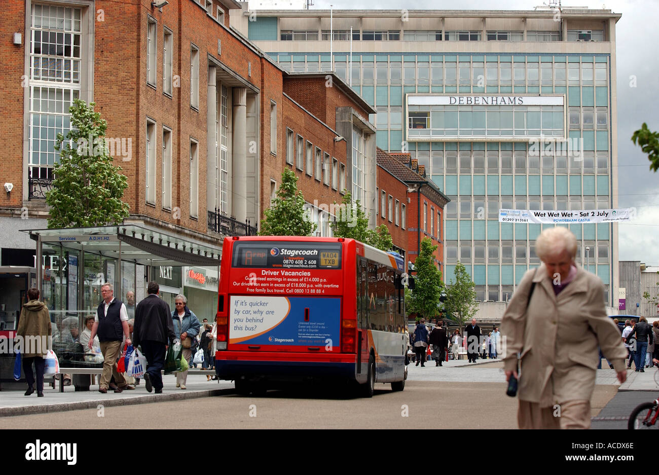 a view of the Exeter high Street Stock Photo - Alamy