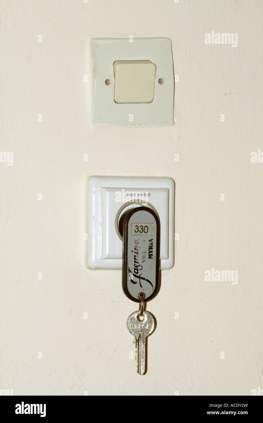 Magnetic key holder that also works as the main electic power on switch ...