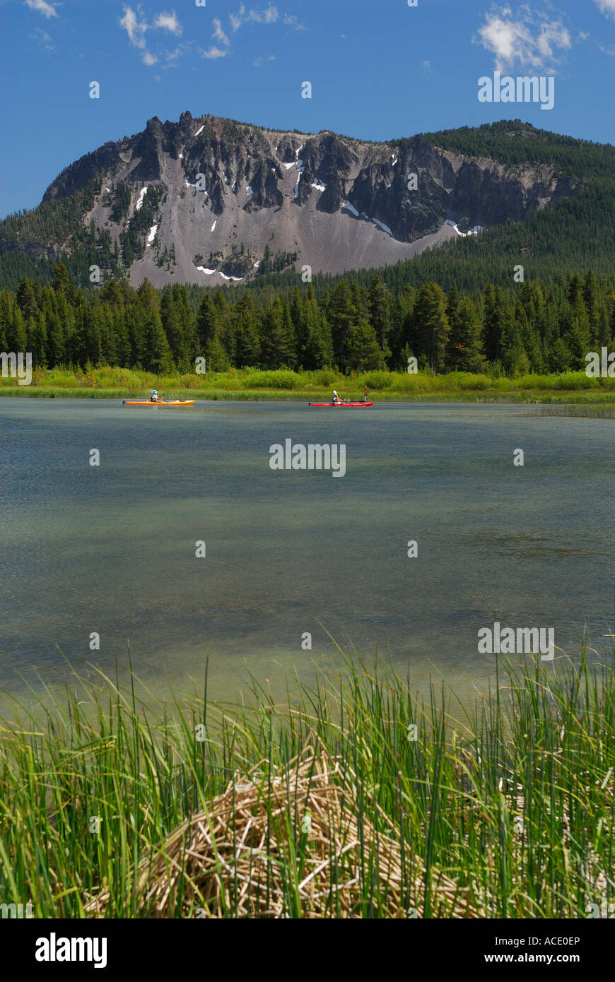 Paulina Peak and kayakers on Paulina Lake Oregon USA Stock Photo - Alamy