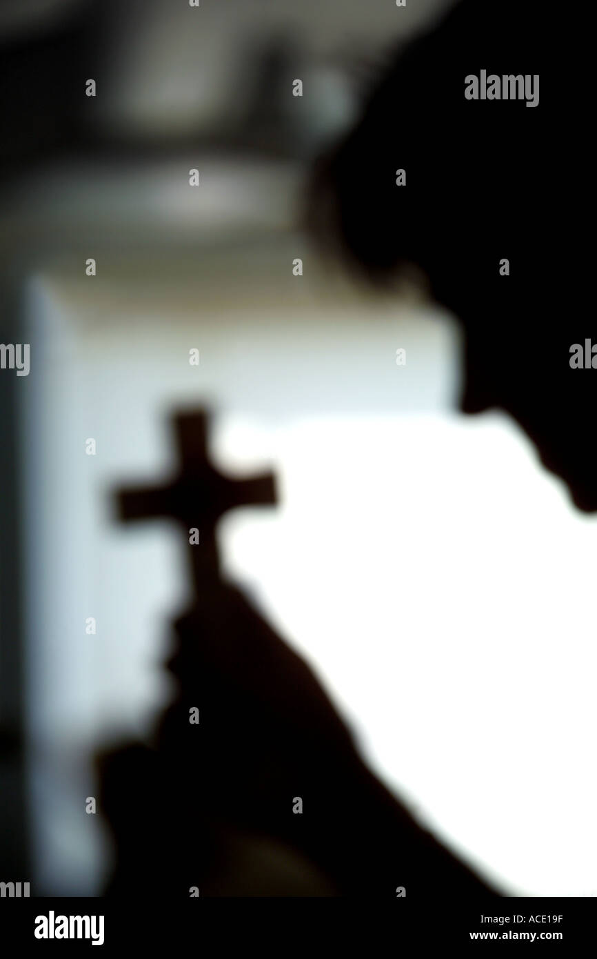 Making sign of the cross catholic hi-res stock photography and images ...