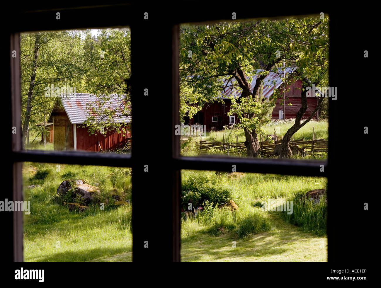 A farm on the countryside seen through a window Stock Photo - Alamy