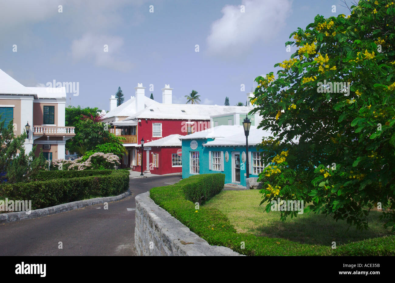 Colonial street scene with pastel colored buildings in St Georges ...