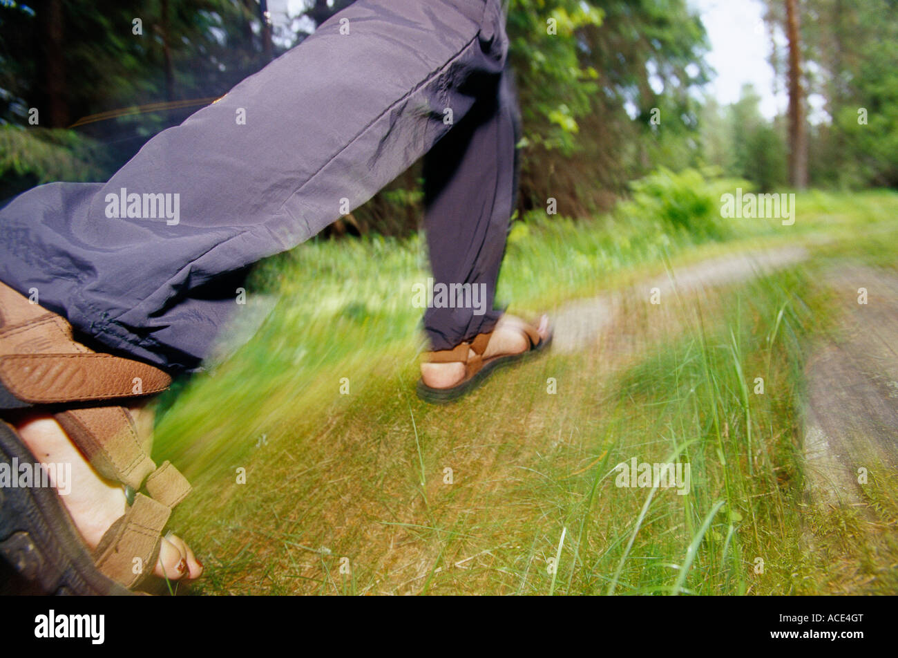 Walking in sandals hi-res stock photography and images - Alamy