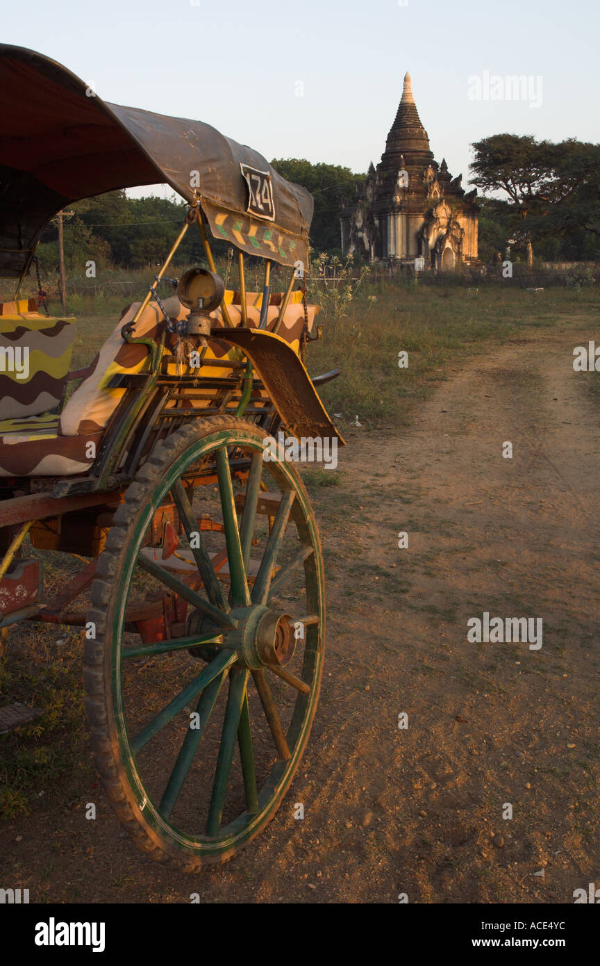 Myanmar Burma Bagan archeological park view at sunset with horse cart ...