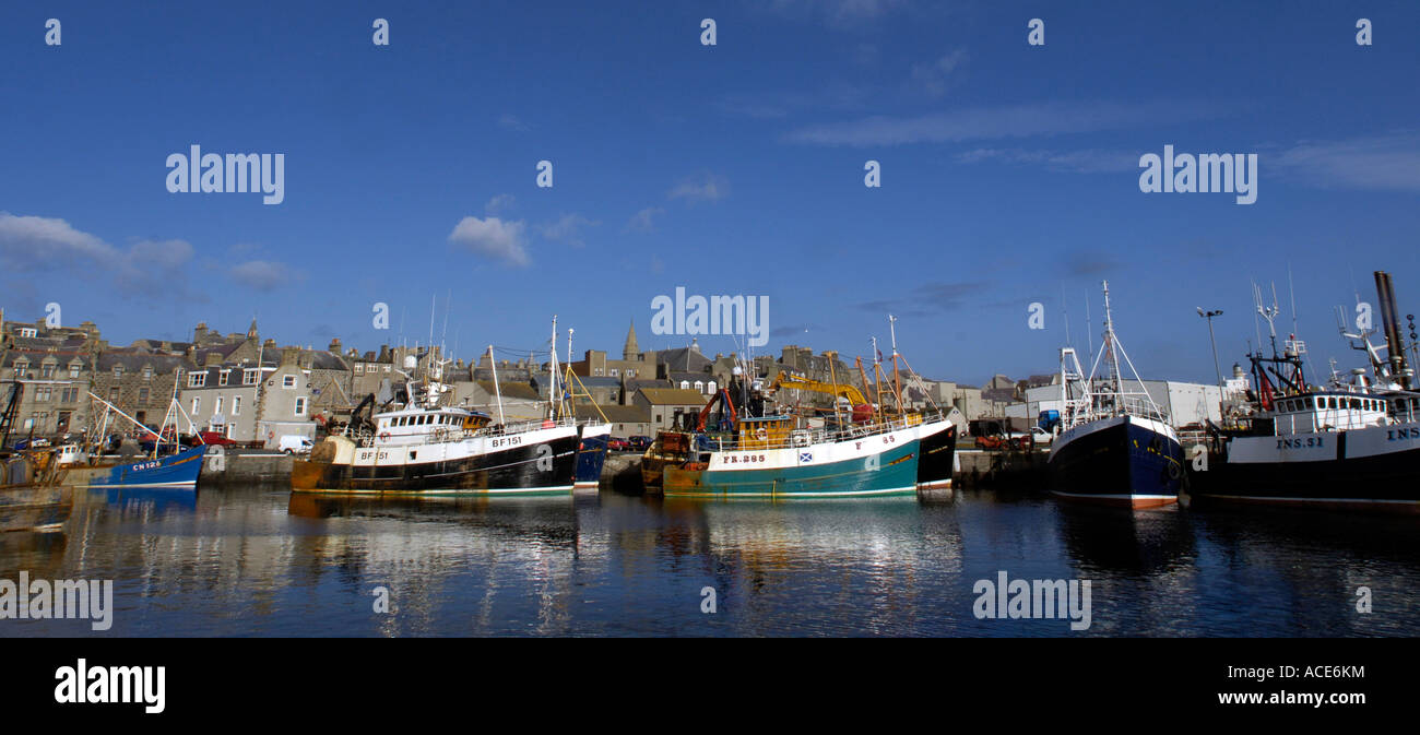 industrial fishing trawlers line up in Fraserburgh harbour ...