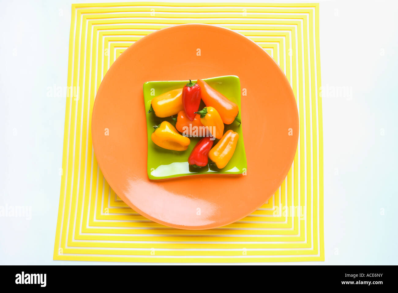 Assorted peppers on plate Stock Photo - Alamy