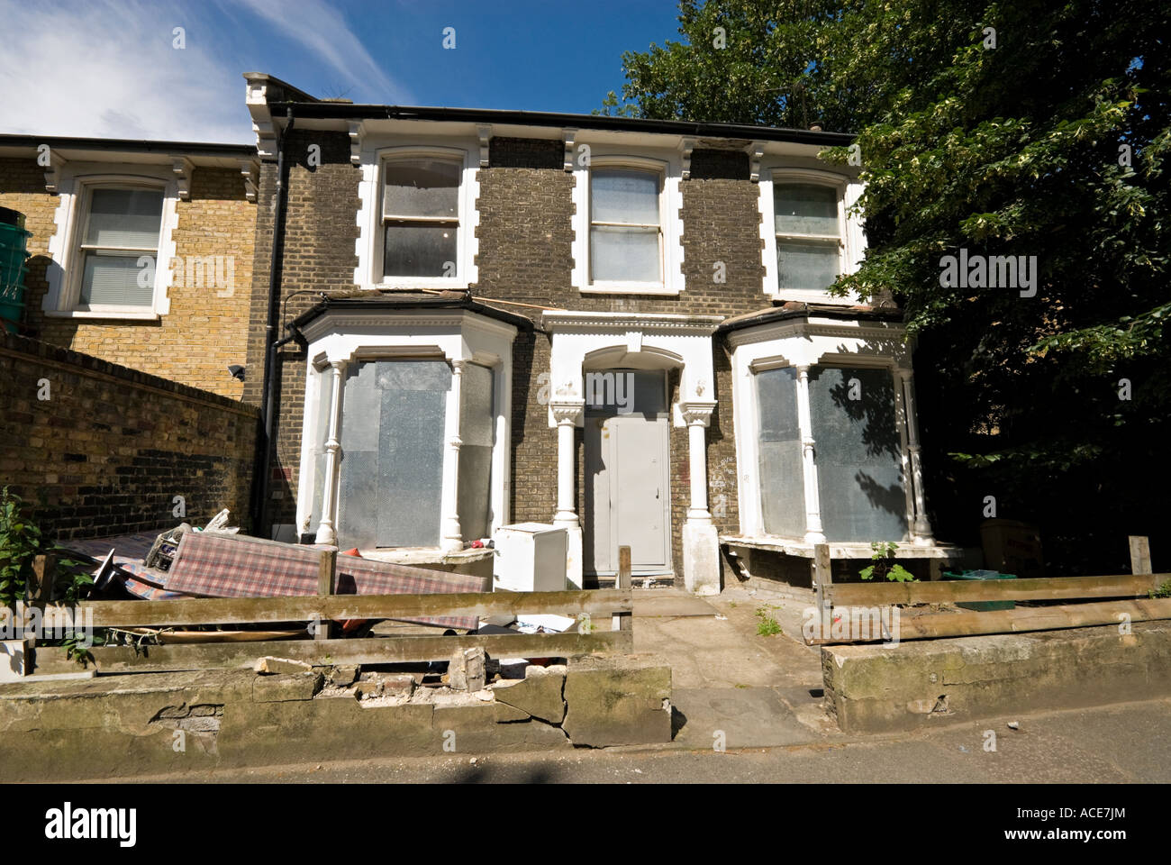 An old neglected house in Hackney needing repair Stock Photo - Alamy