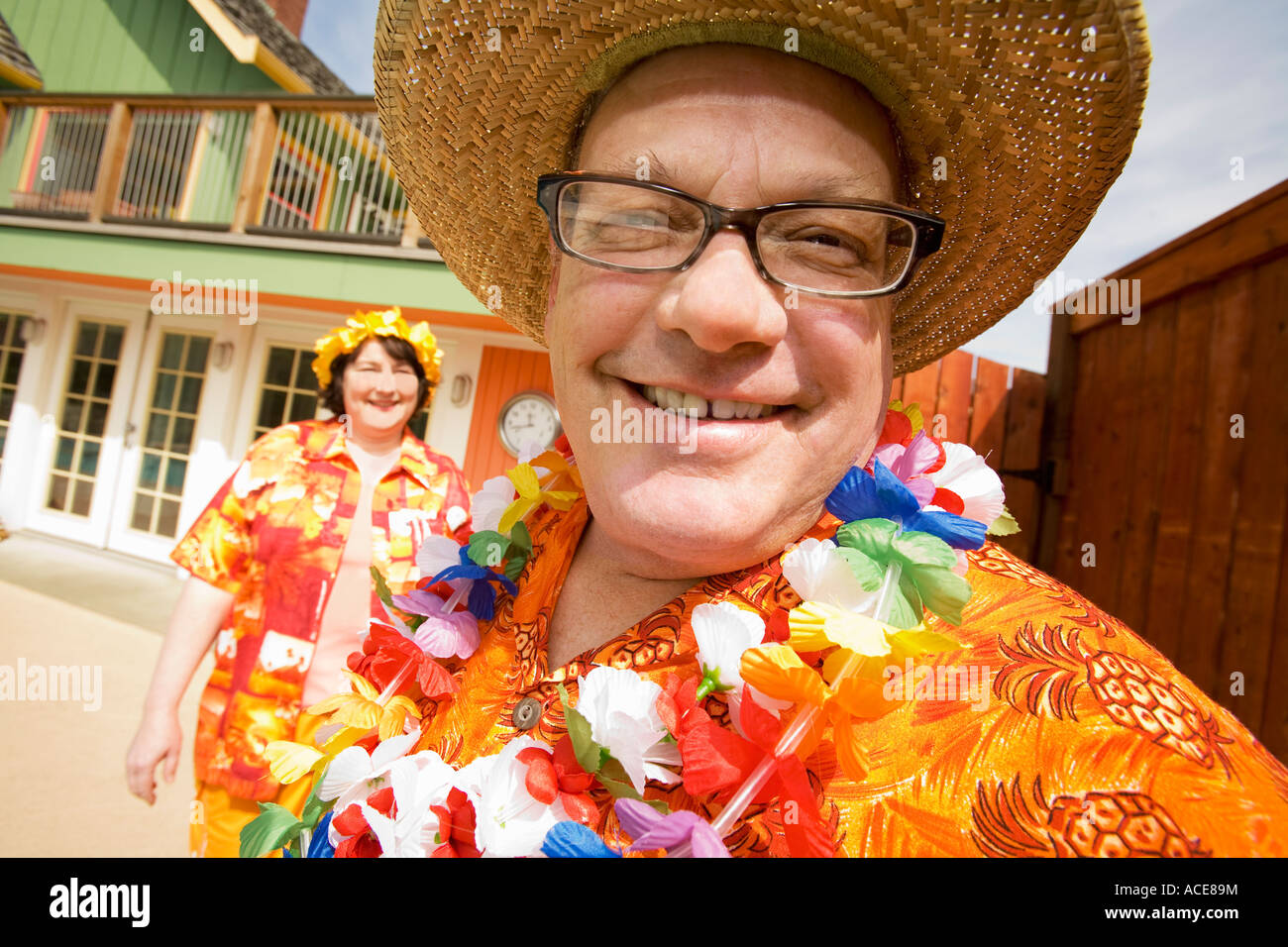 Couple wearing festive outfits Stock Photo - Alamy
