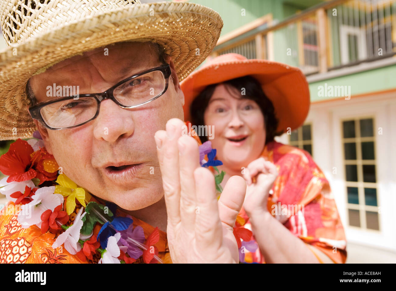 Couple wearing festive outfits Stock Photo - Alamy