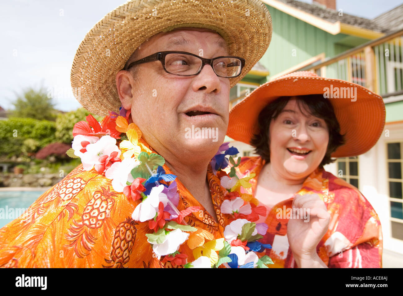 Couple wearing festive outfits Stock Photo - Alamy