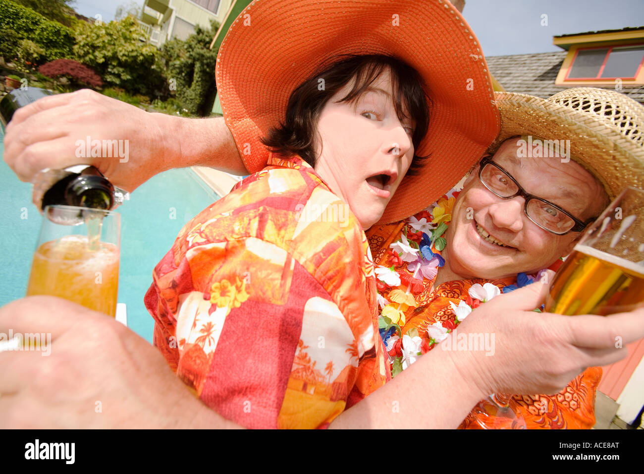 Couple wearing festive outfits Stock Photo - Alamy