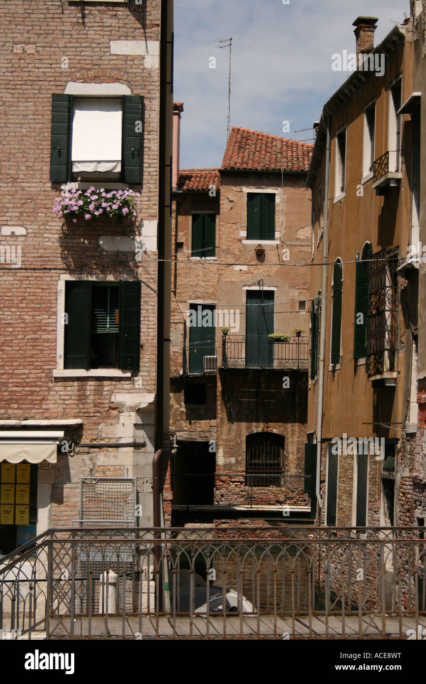 Venice,Italy,old buildings in back street with window boxes Stock Photo ...