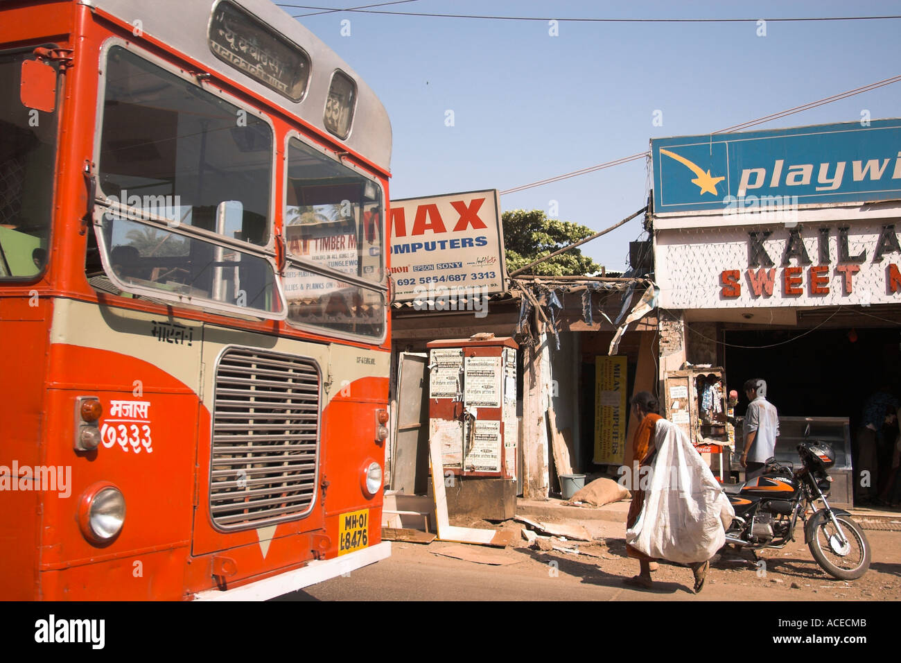 Red bus in Mumbai, India Stock Photo - Alamy