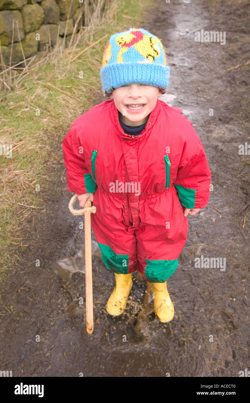 a child splashing in a puddle, Ilkley, West yorkshire, UK Stock Photo ...