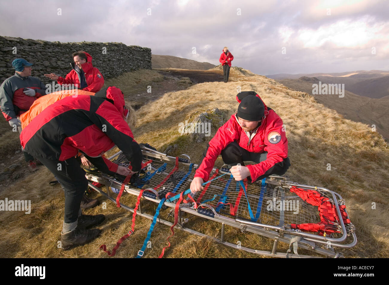 members of langdale ambleside mountain rescue team asemble a stretcher ...
