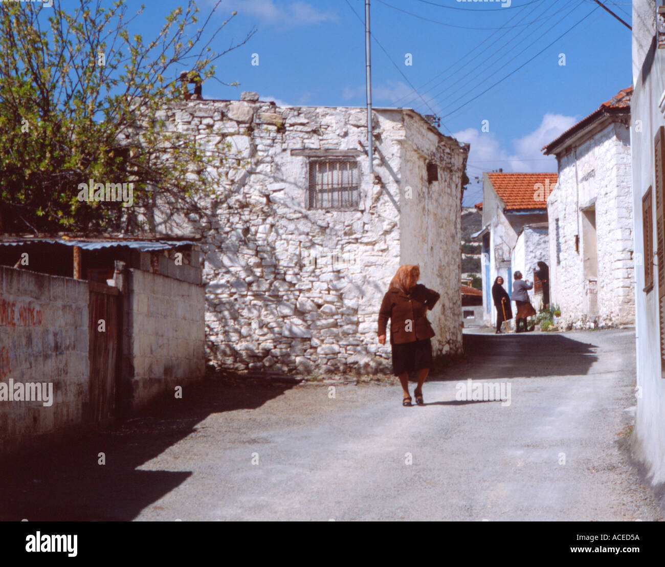 Old ladies walking the streets in Cyprus village Stock Photo - Alamy