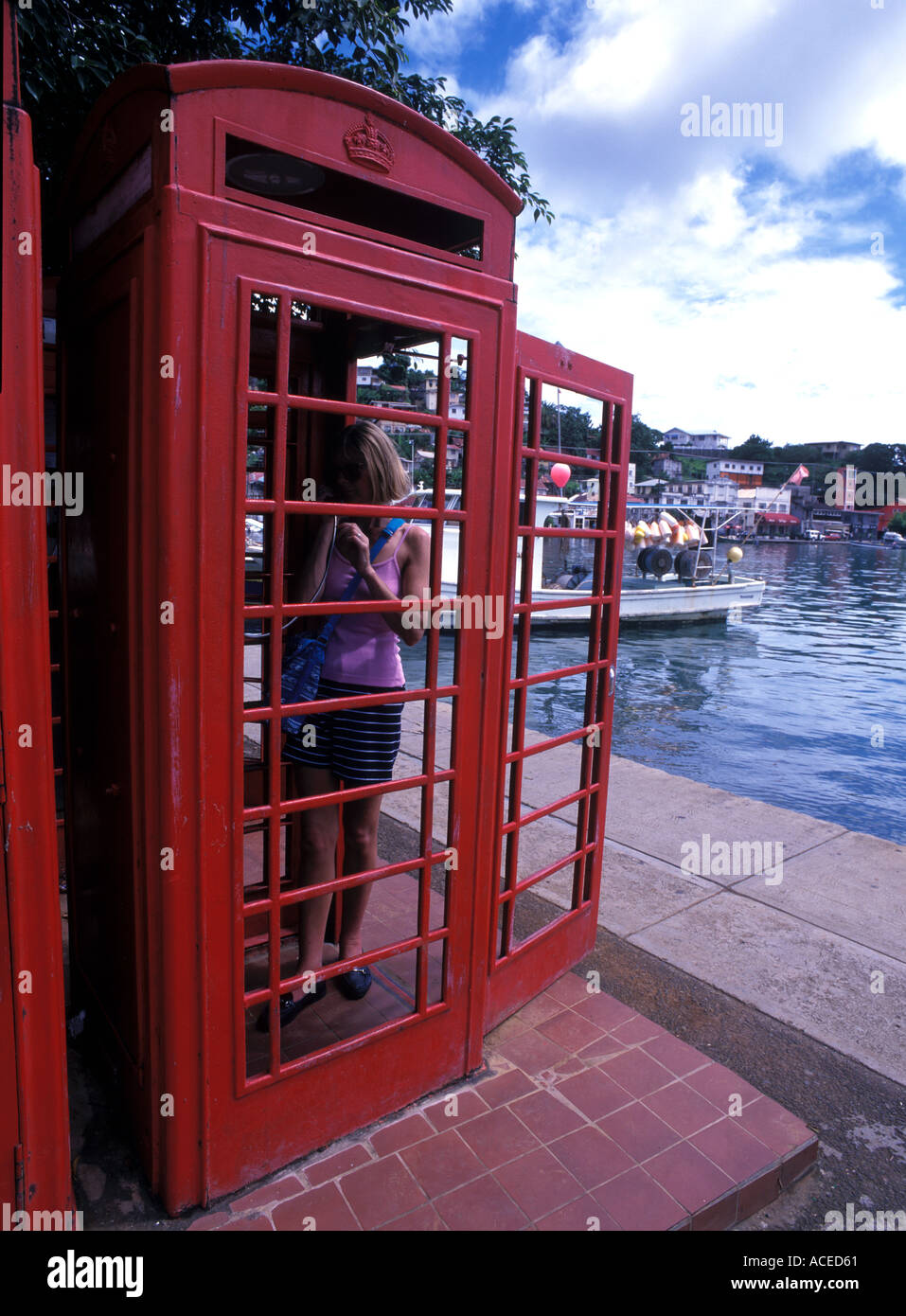 Traditional red British phone box in St Georges Harbour Grenada Stock ...