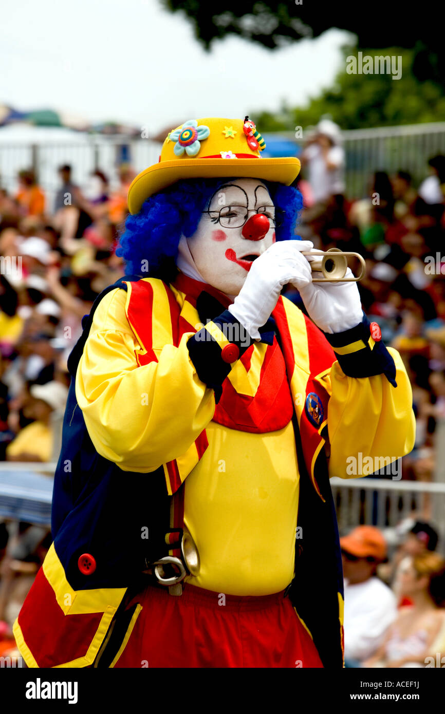 Clown Fiesta Parade yellow hat parade Stock Photo - Alamy