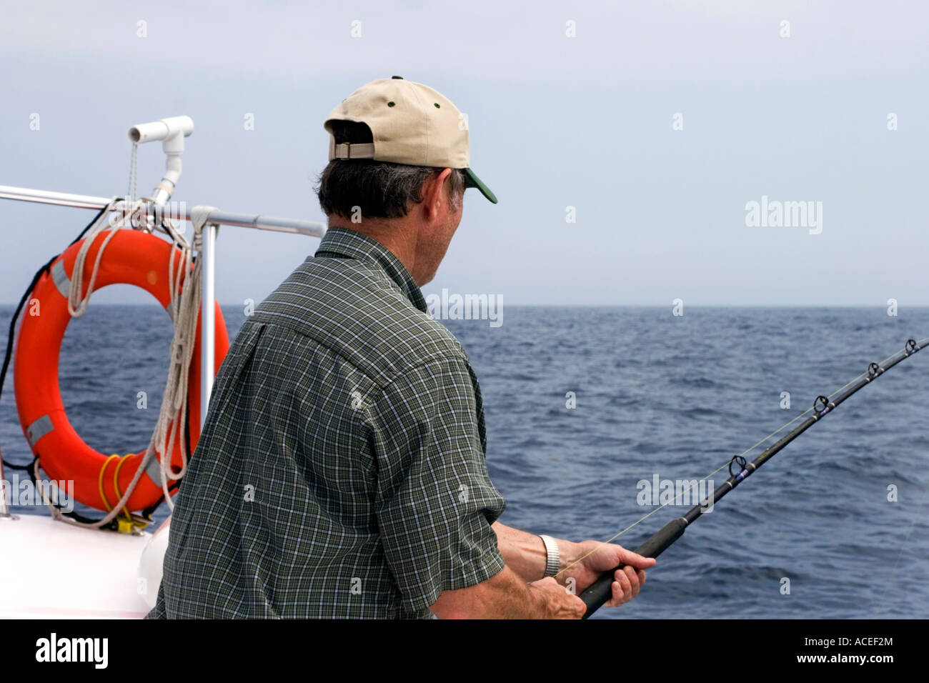 Life preserver man ocean hi-res stock photography and images - Alamy