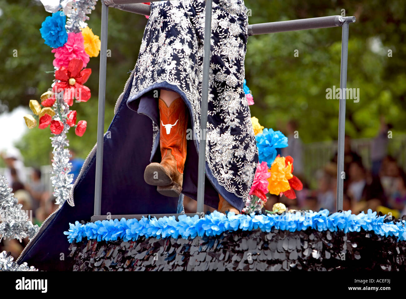 Fiesta Parade queen wearing worn out Texas boots Stock Photo - Alamy