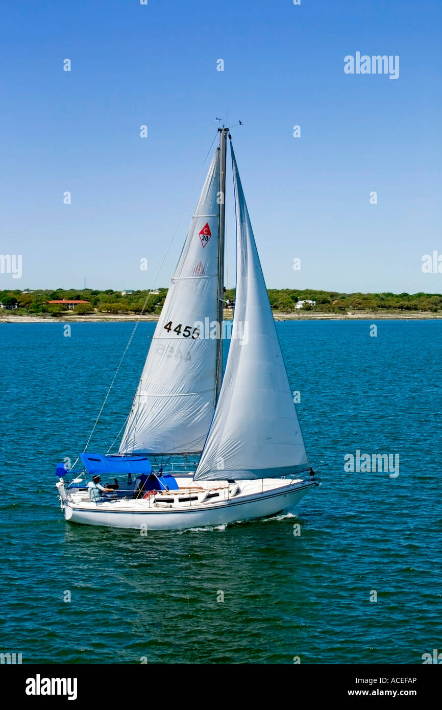 Sailboat lake starboard verticle Stock Photo - Alamy