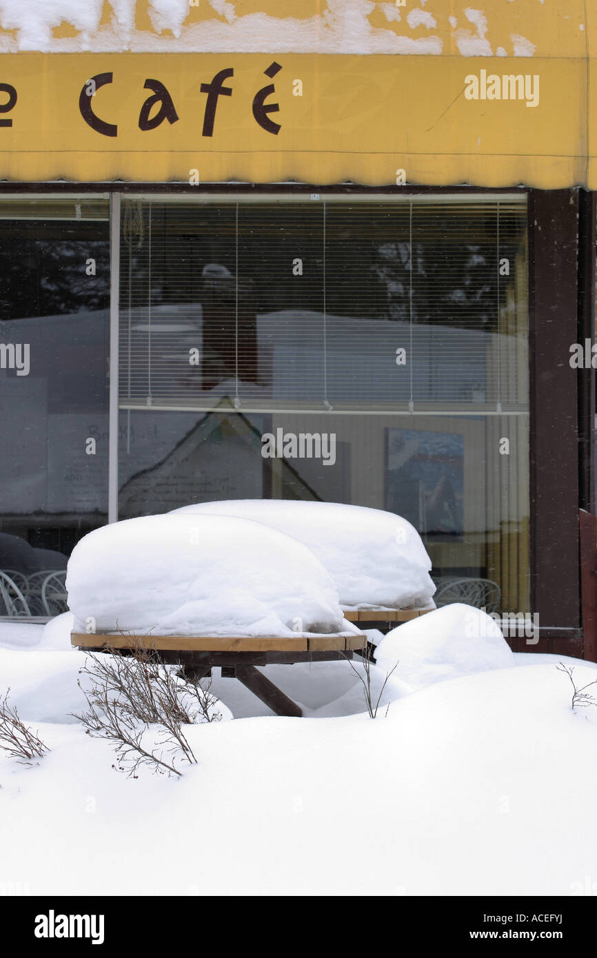 Snow on cafe tables Stock Photo - Alamy