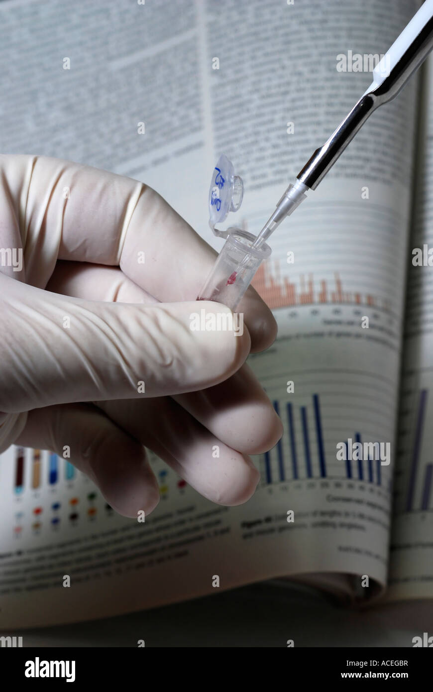 DNA research with graphics charts reference in the background Stock ...