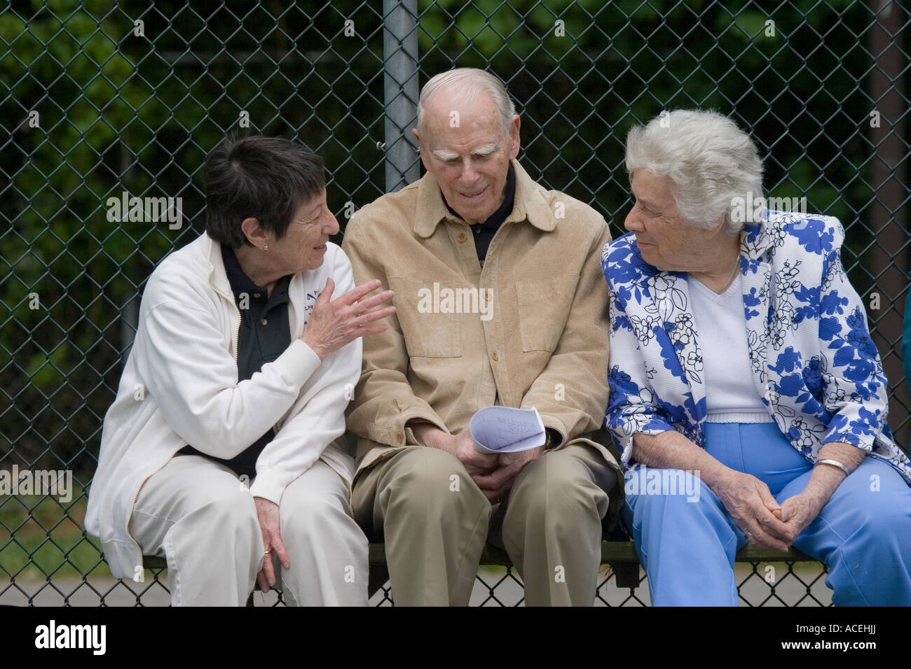 Old Friends Sitting On Bench