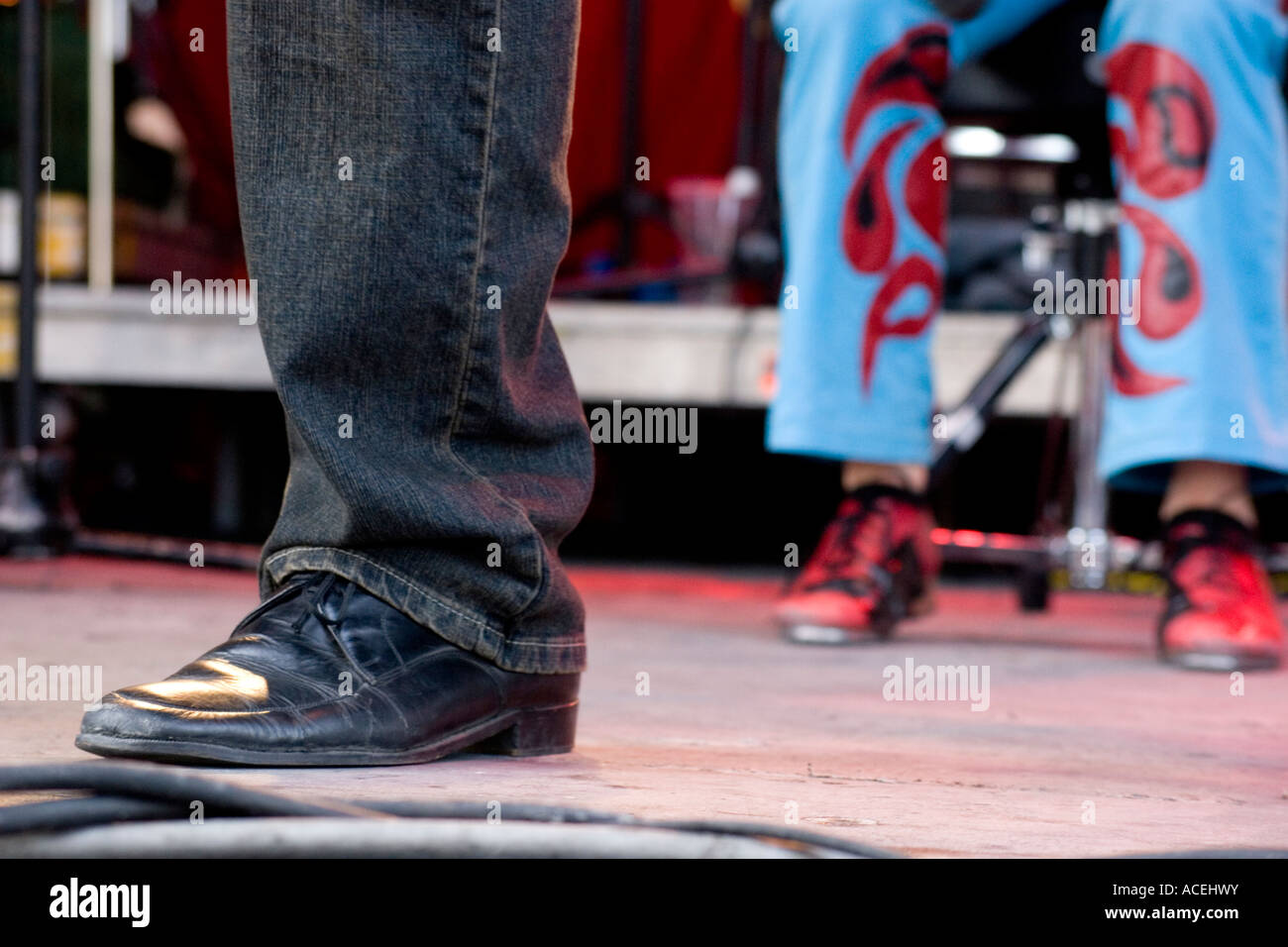 Low section of performers on stage Stock Photo - Alamy