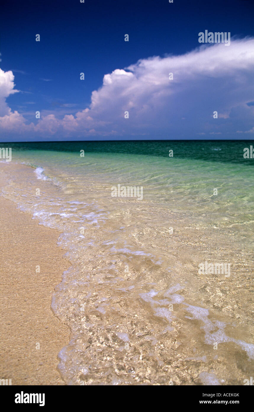 Waves lap on the shore of Pulau Kuraman (Kuraman Island), Malaysia, off ...