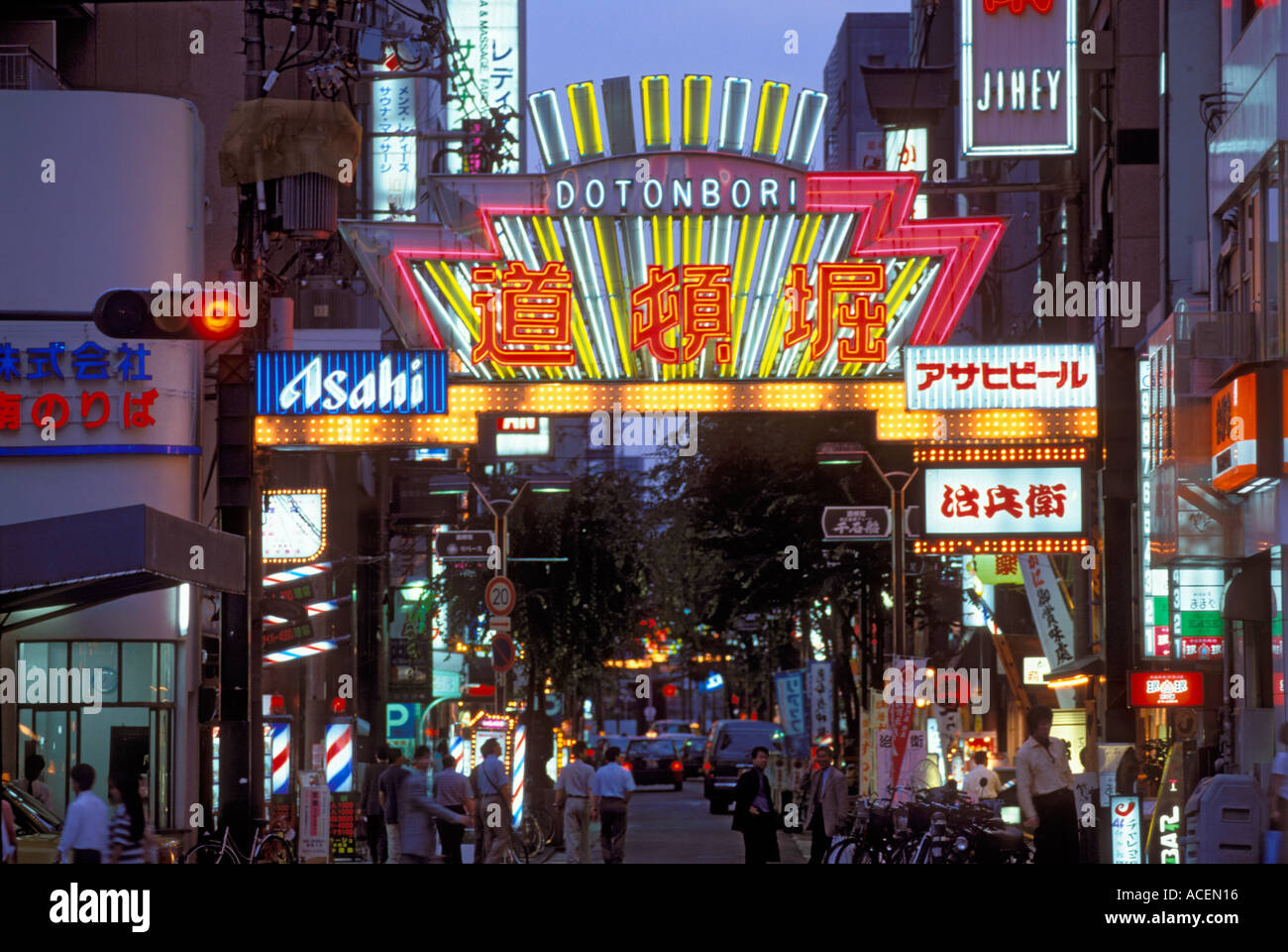 Neon signs light up the famous Dotonbori restaurant and entertainment ...