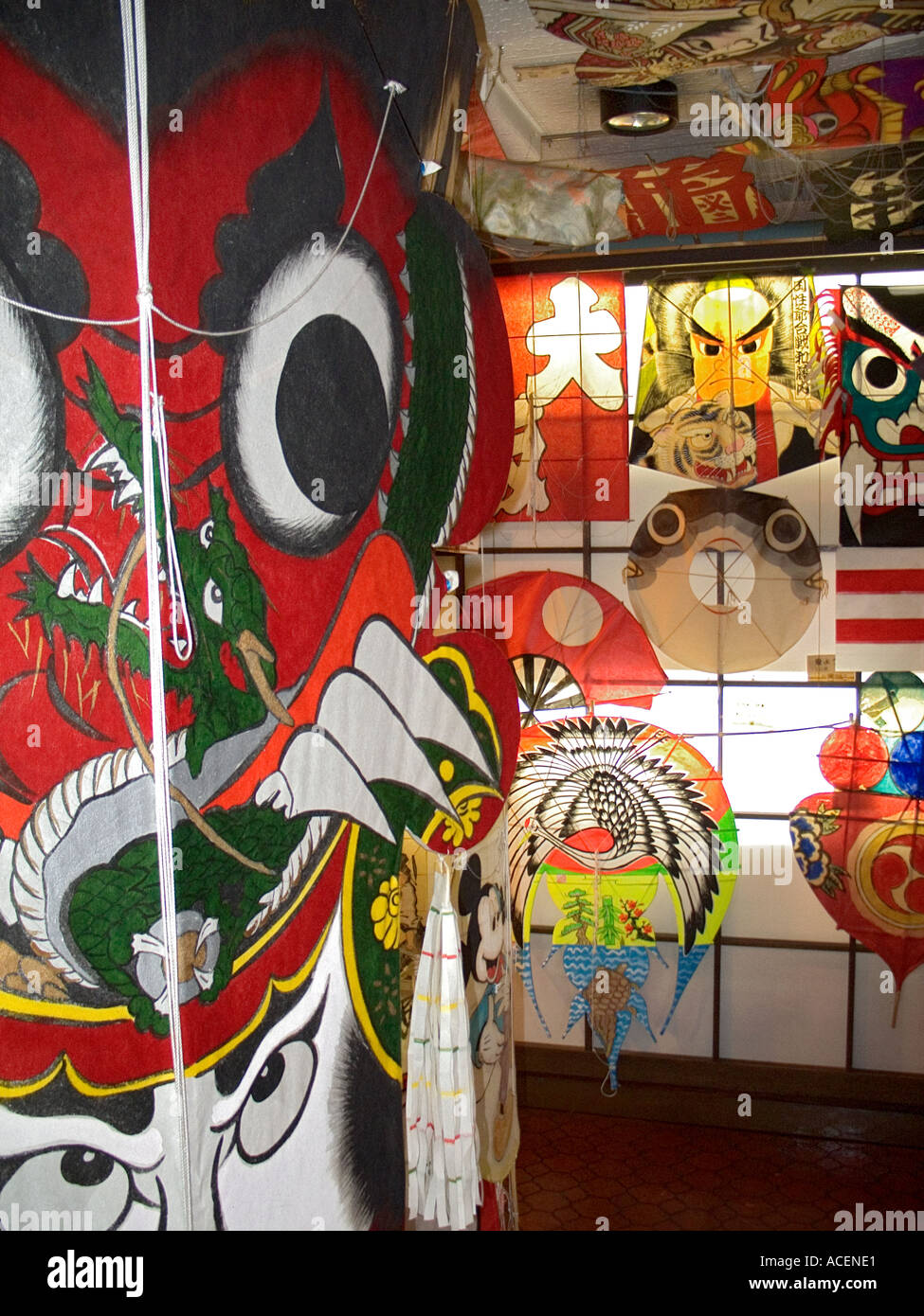 Colorful artistic paper and bamboo kites of every size and shape fill ...