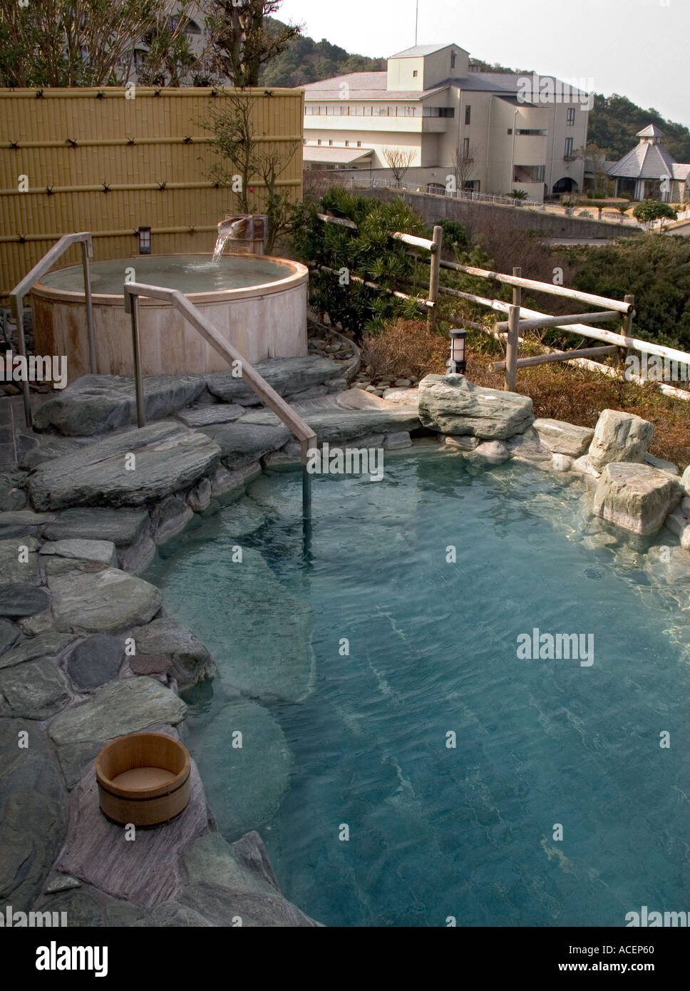 Natural outdoor soaking pool called rotenburo at an onsen hot springs ...