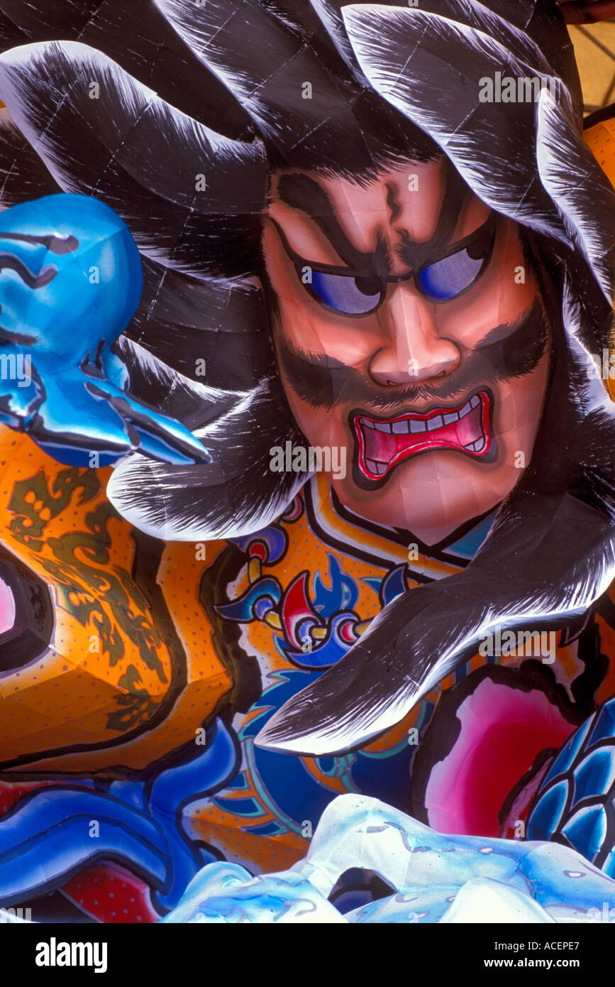 Colorful paper mache fighting warrior 3D artwork on a float at the ...