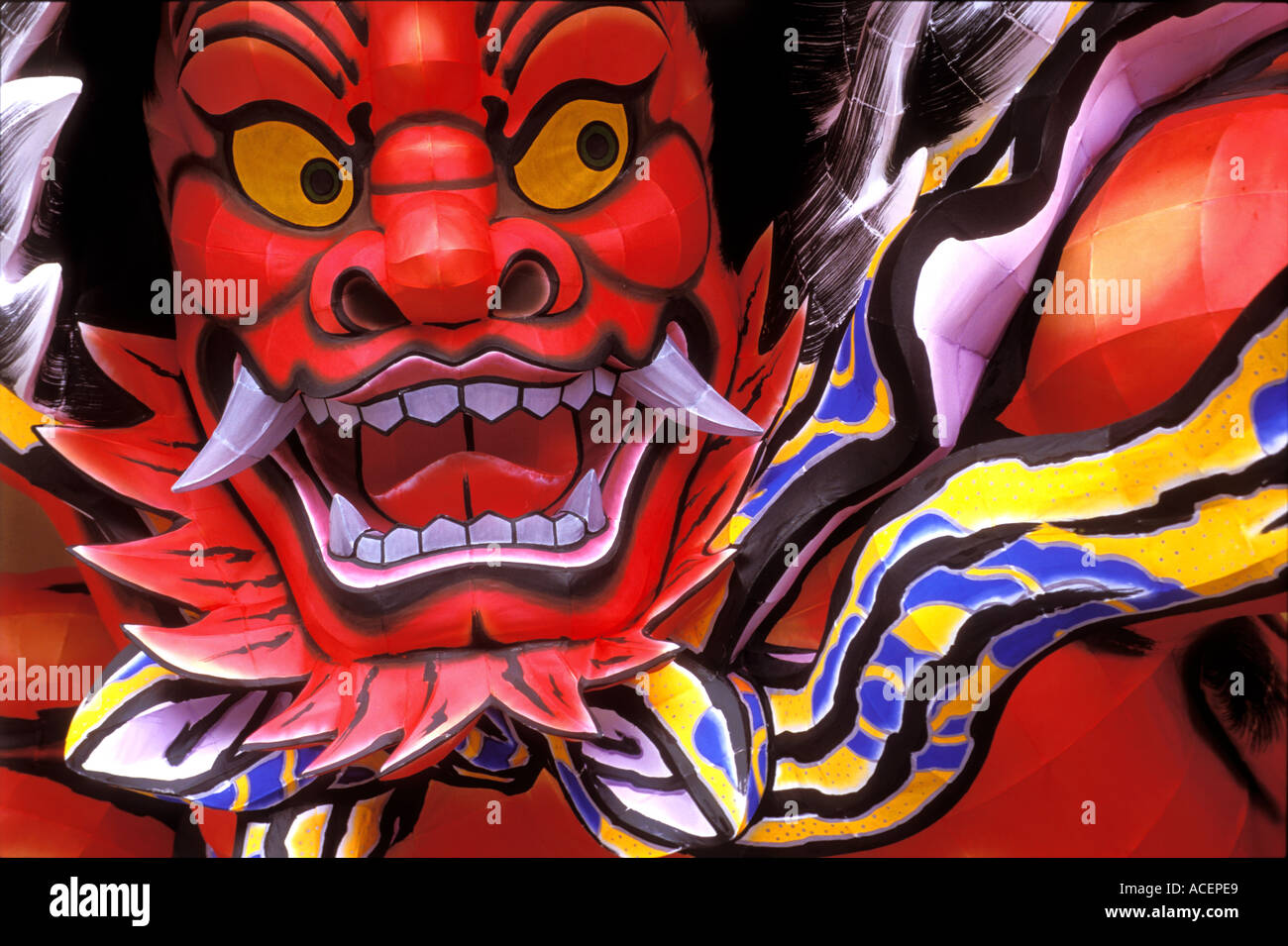 Frightening, stunning red devil face on float at Nebuta Matsuri summer ...